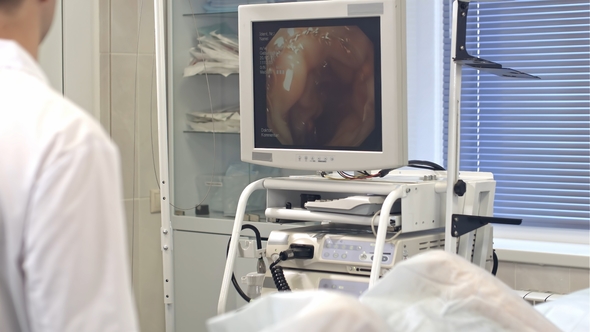 Surgeon Looking at the Monitor During Endoscopy, Stock Footage | VideoHive