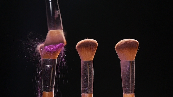 Cosmetics Brushes and Explosion Colorful Makeup Powder, Stock Footage