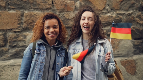 Portrait of Happy Students in Germany Pretty Girls Waving German Flags ...