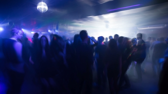 Timelapse Party in Night Club, Crowd people dance, Disco ball spin and ...