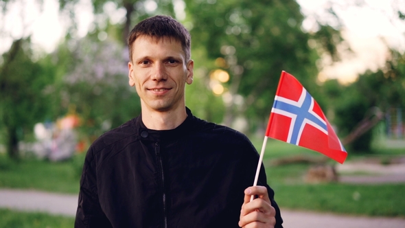 Portrait of Happy Norwegian Student Holding Official National Flag ...