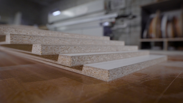 Cut Pieces of Chipboard Are Lying on a Worktable in a Joinery Shop ...