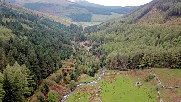 Aerial View of a Valley with River and Waterfall in Wales - United ...