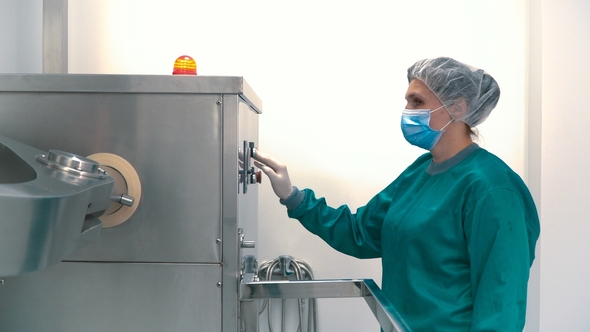 Laboratory Worker Adjust Pharmaceutical Machine for Mixing Powder and ...