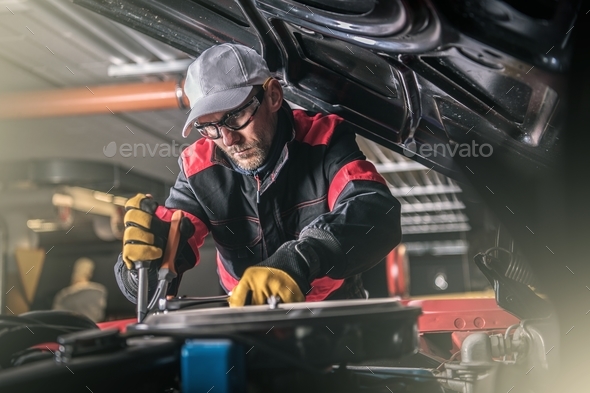 Automotive Pro Mechanic Stock Photo by duallogic | PhotoDune