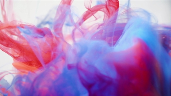 Blue and Red Ink Mixing Together Over a Pure White Background, Stock ...