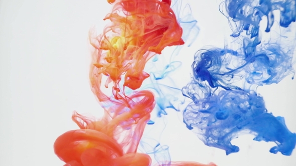 Blue and Red Ink Mixing Together Over a Pure White Background, Stock ...