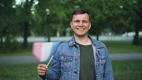Portrait of Handsome Frenchman Proud Patriot Waving French Flag with ...