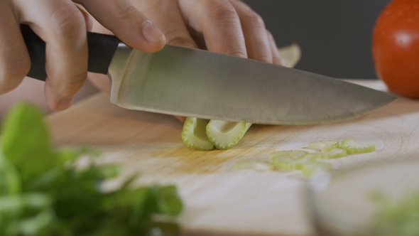 Hand of an Expert Chef Cuts Celery, Stock Footage | VideoHive