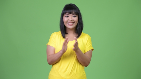 Beautiful Happy Asian Woman Clapping Hands, Stock Footage | VideoHive