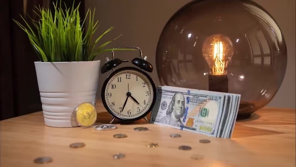 Bitcoin Fast Rising Price. View of Bitcoins, Alarm Clock and Small ...