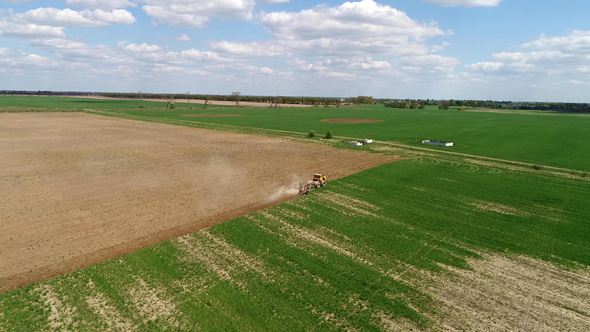 Aerial Footage of a Tractor on a Field, Stock Footage | VideoHive