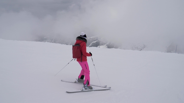 Woman Skier Skiing Down The Mountain Slope In A Heavy Fog, Stock Footage