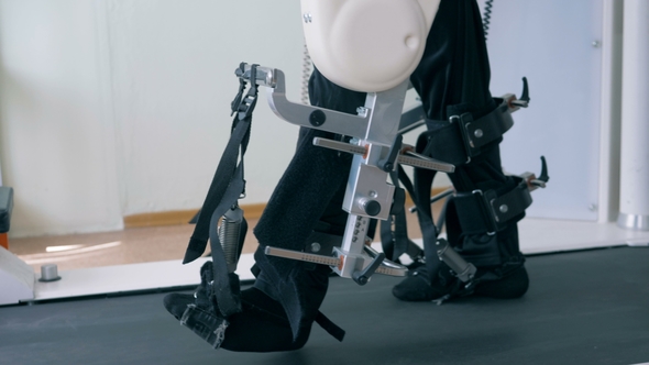 Disabled Man Is Exercising on a Walking Simulation Machine, Stock Footage
