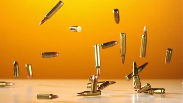 Bullets falling bouncing in ultra slow motion , Stock Footage | VideoHive