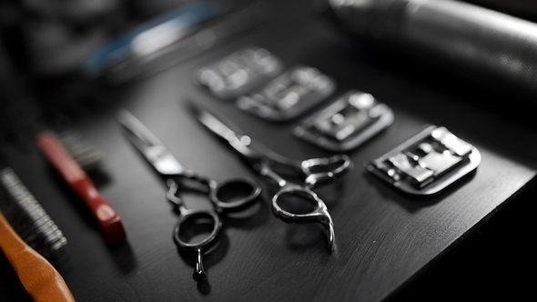Table with Scissors and Trimmers at the Barber Shop, Making of Haircuts ...
