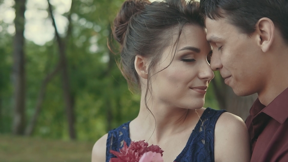 Beautiful Happy Couple Softly Touching in Park. Man Tenderly Hugging ...