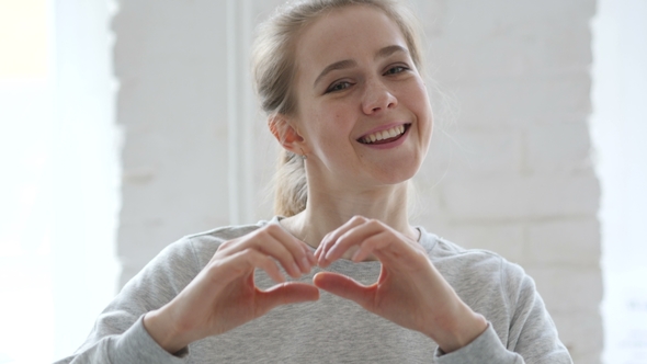 Heart Sign By Young Woman in Love, Hands Gesture, Stock Footage | VideoHive