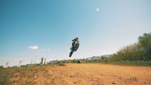 Panoramic View of a Racer's Jumping Trick Performed on a Motorcycle ...