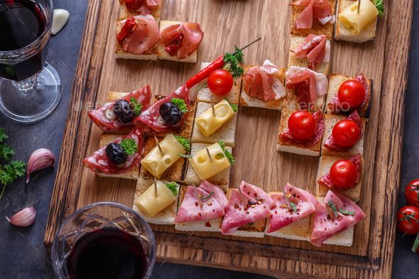Pinxtos, tapas, spanish canape party finger food Stock Photo by kopachinsky
