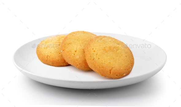 cookie in a plate isolated on a white background Stock Photo by sommai