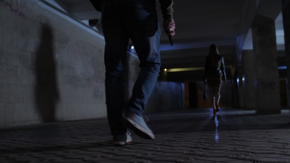 Male Legs with Knife Chasing Woman in Tunnel, Stock Footage | VideoHive