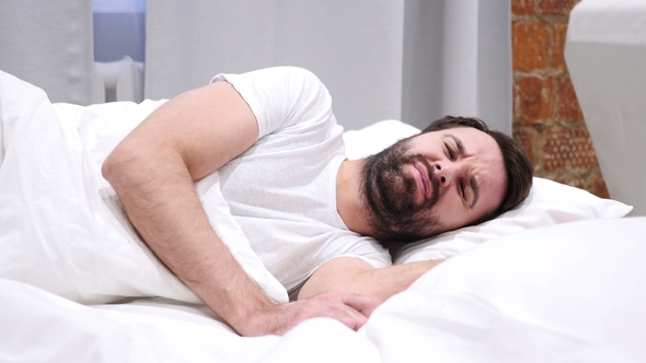 Uncomfortable Man Sleeping on Side in Bed at Night, Restlessness, Stock ...