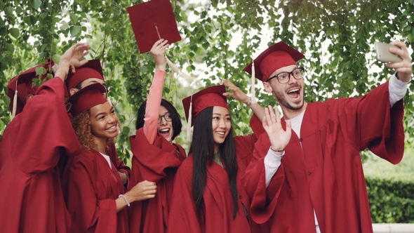 Graduating Students Girls and Guys Are Taking Selfie on Graduation Day ...