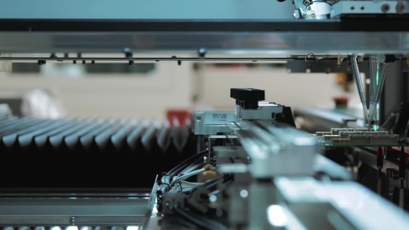 Robotic Machine Testing Circuit Boards for Serviceability, Stock Footage