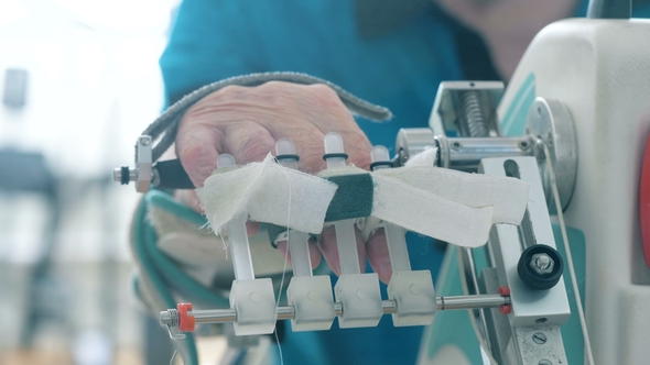 Clinical Equipment Helps a Patient To Move Fingers, Stock Footage ...