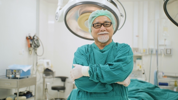 Portrait of Senior Male Surgeon in Operating Theater, Stock Footage