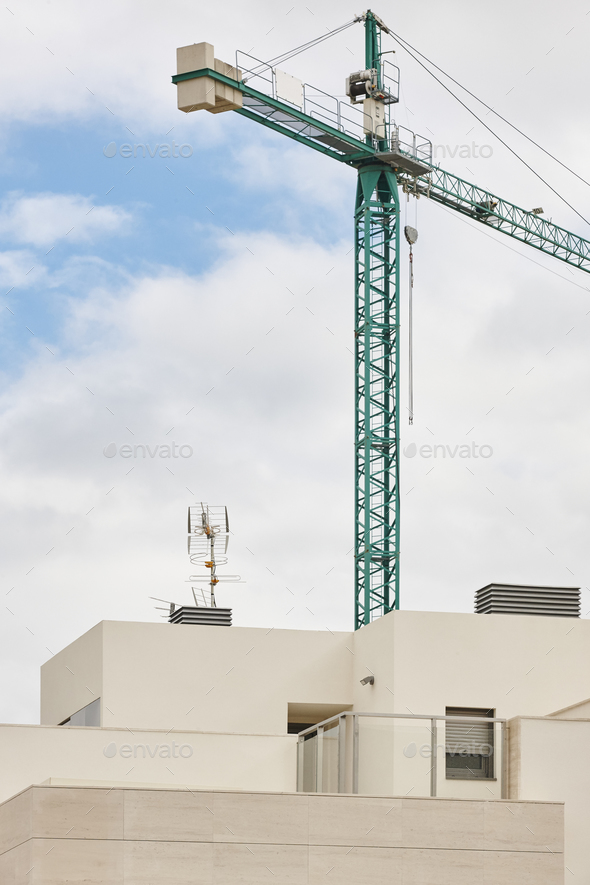 Modern building and crane machinery structure. Construction industry ...