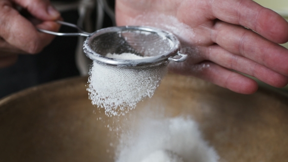 Female Hands Sifting Flour By Bowl, Stock Footage | VideoHive