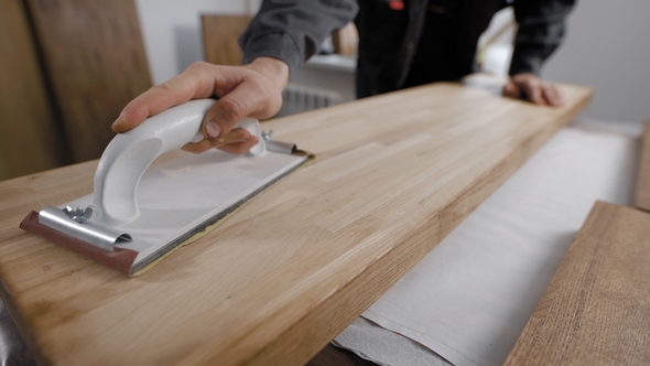 Hand of Man Holding Instrument and Polishing Light Wooden Panel, Stock ...