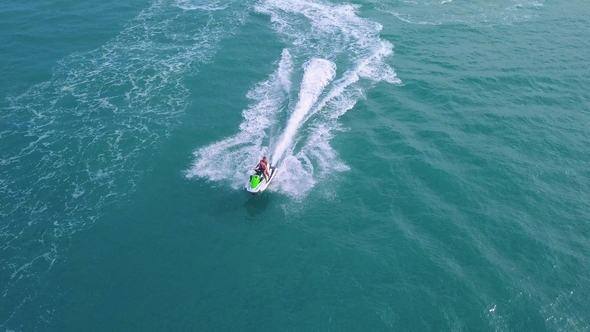 Aerial View of Jet Ski Riding in Sea, Stock Footage | VideoHive