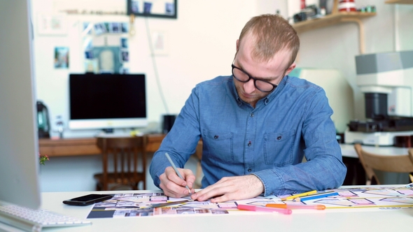 Hipster Engineer Works with Blueprint Shoot From Above Young ...