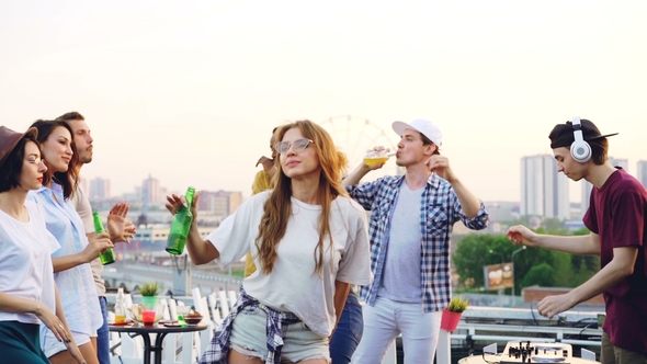 of Attractive Girls and Guys Students Dancing at Open-air Party with ...