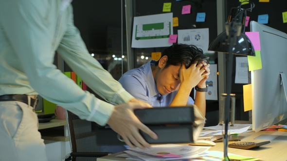 Overworked Businessman Working Late at Night in the Office, Stock Footage