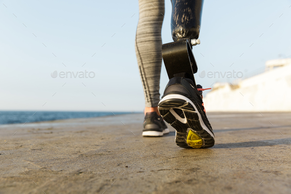 Close up back view of disabled athlete woman - Stock Image - Everypixel
