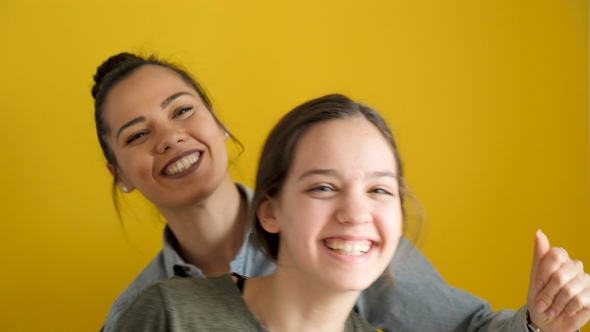 Happy Younger and Oldest Sisters Dancing and Laughing, Stock Footage