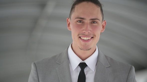 Portrait Of Young Businessman Smiling, Stock Footage | VideoHive