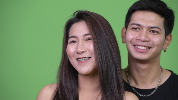 Young Happy Asian Couple Thinking Together, Stock Footage | VideoHive