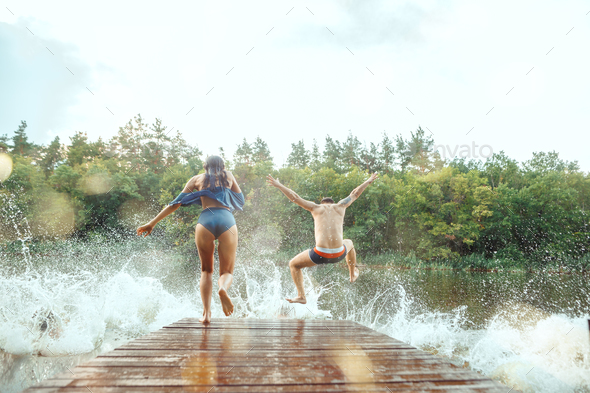 Enjoying river party with friends. Group of beautiful happy young ...