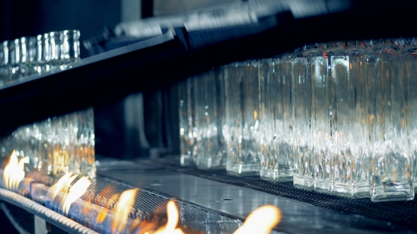 Special Equipment Burns Glass Bottles with Fire at a Plant, Stock Footage
