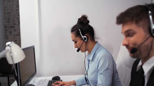 Customer Service Team Taking Calls in Busy Call Centre, Stock Footage