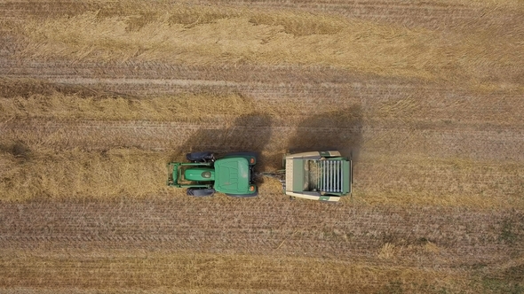 Aerial of Working Hay Baler Tractor, Stock Footage | VideoHive