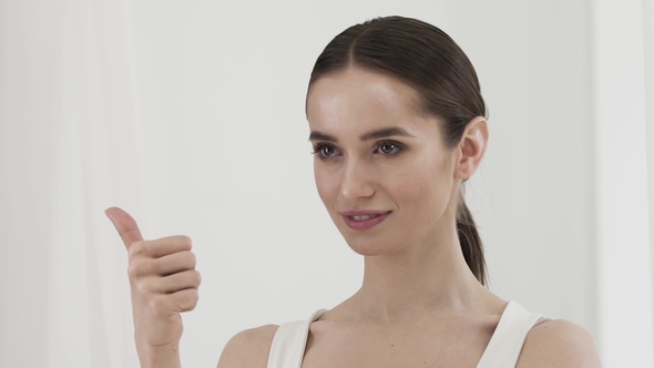 Beautiful Woman Counting On Fingers To Five, Stock Footage | VideoHive