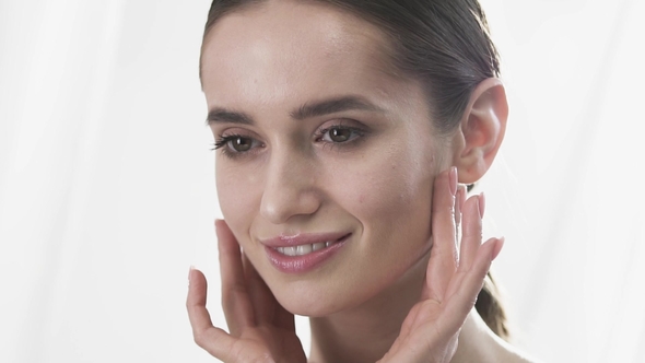 Beautiful Woman Touching Face Skin And Smiling, Stock Footage | VideoHive