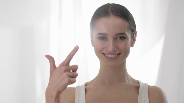 Attractive Woman Counting To Five On Fingers, Stock Footage | VideoHive