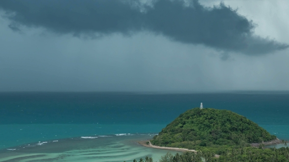 of Tropical Island Coast with Approaching Rain Clouds, Stock Footage
